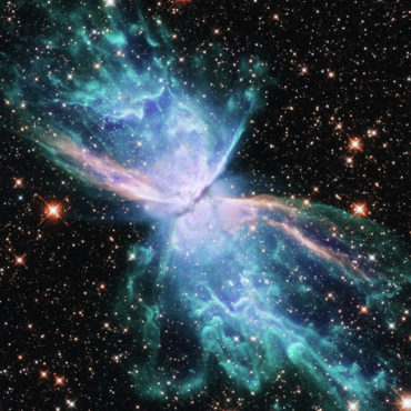 Hubble Space Telescope Captures a Cosmic Cloud Speckled with Stars in ...